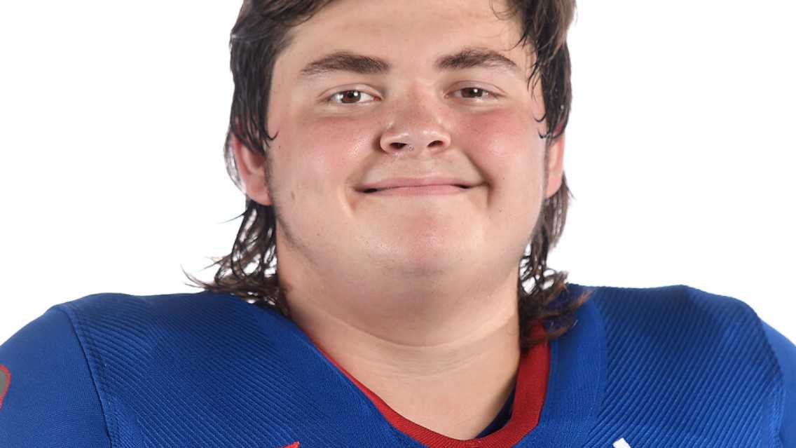 Kansas football lineman charged in connection with alleged bomb threat