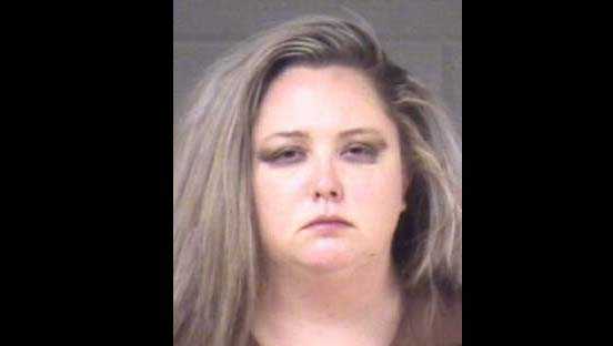 Buncombe County: Woman charged in man's death