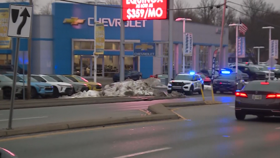 Police: Employee arrested after shots fired inside car dealership in ...
