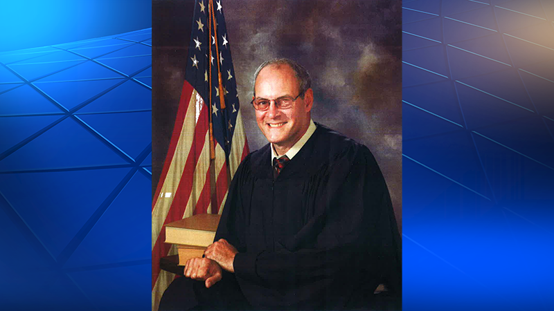 One suspect dead, another in custody after judge shot outside of ...