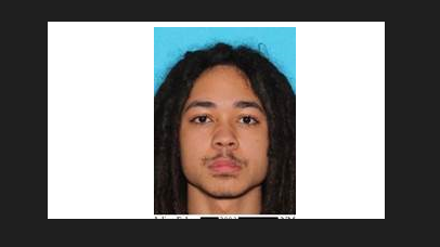 Police identify 'armed and dangerous' murder suspect