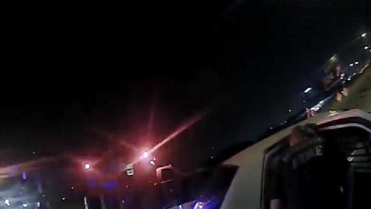 Caught on camera: Officer jumps from freeway ramp to avoid drunk driver