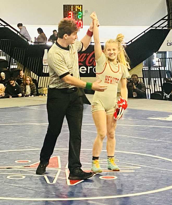 Alabama teen beauty queen wins state high school wrestling title