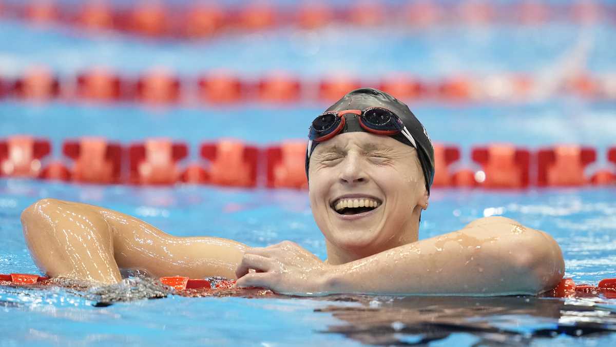 Katie Ledecky laps Michael Phelps for most individual world titles