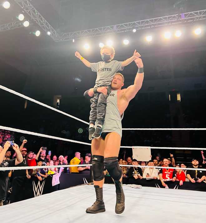 Springboro fourth grader serves as special guest at WWE event