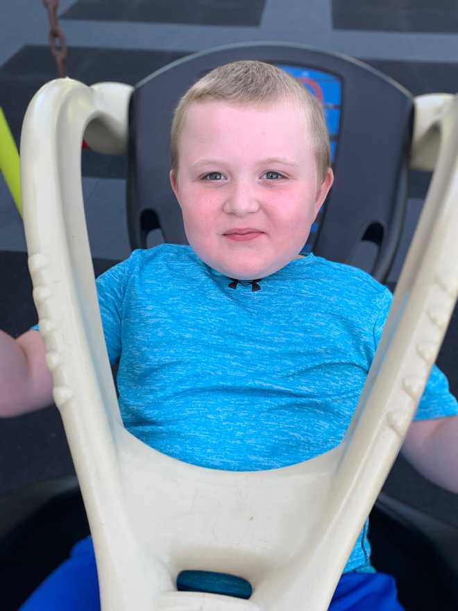 Pella mom raises money so kids with disabilities can participate in races