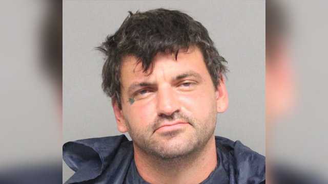 Nebraska man charged with assault after spitting on officers Nebraska man charged with assault after spitting on officers