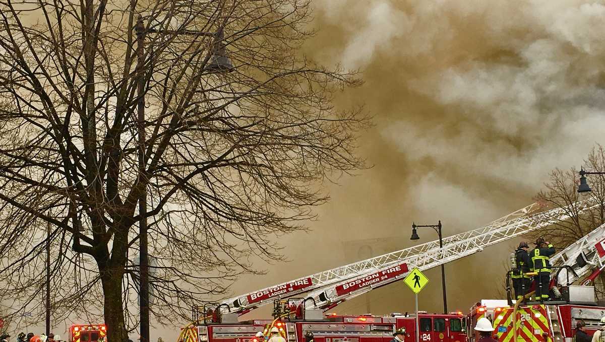 Raging fire at East Boston business prompts evacuations, MBTA disruption