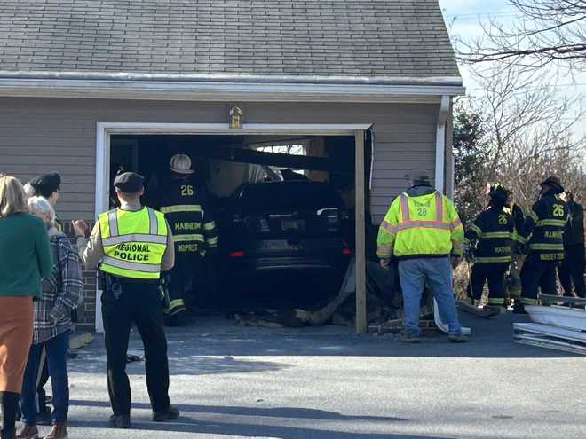 Person trying to move garbage cans drives through back of Lancaster ...