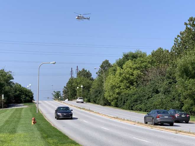 LOW-FLYING HELICOPTER checks power lines in Lancaster County