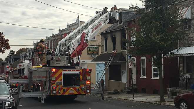 Crews battle three-alarm fire in Lancaster