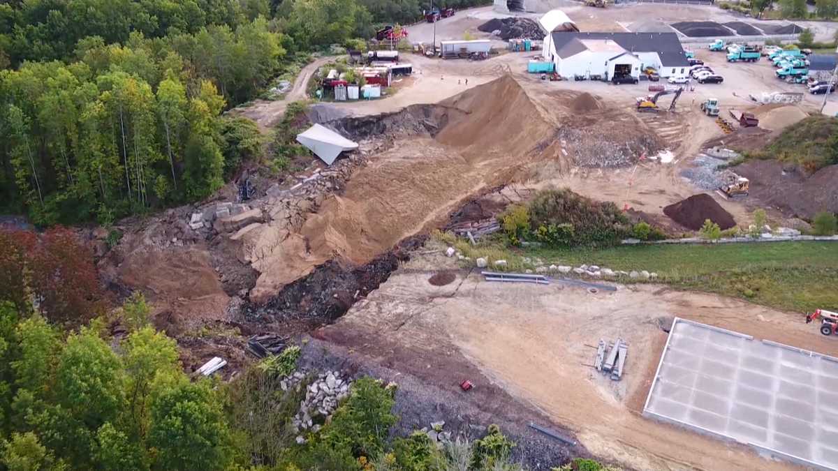 Officials discuss next steps after landslide blocks Presumpscot River ...