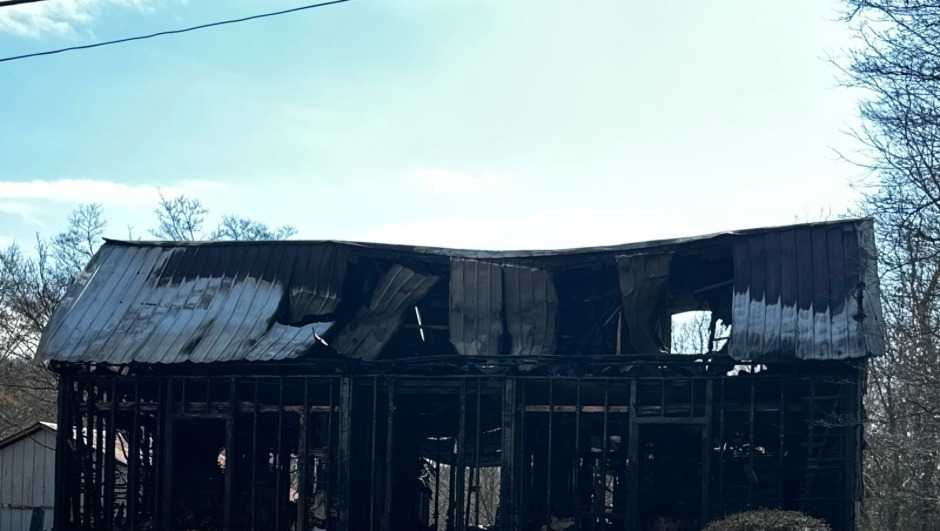 Woman charged with arson after she escaped house fire