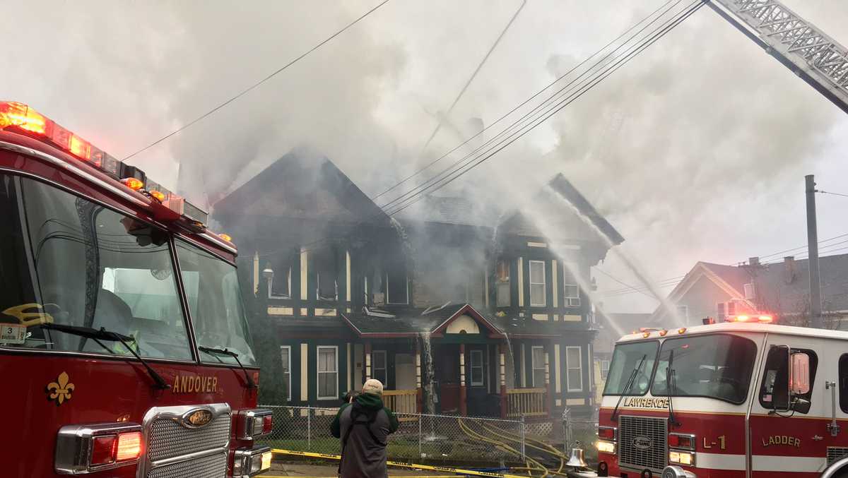 Uncut video: Fire burns Lawrence home