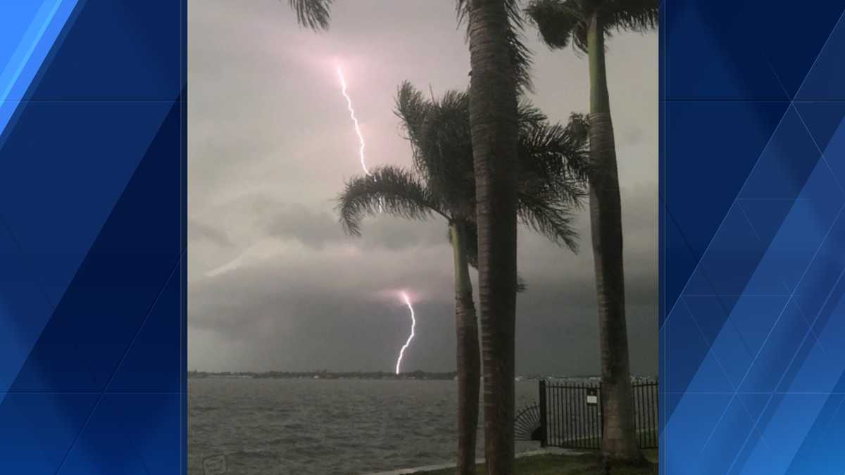 Watch lightning strike the ocean near this boat off the coast of Florida