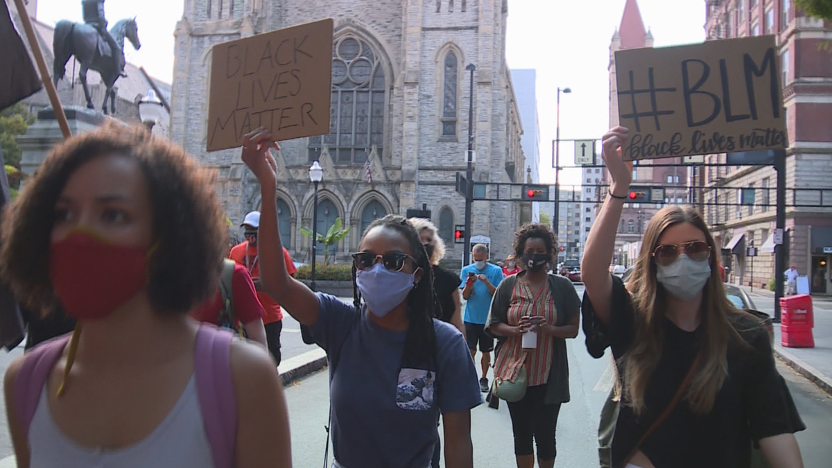 Families of police shooting victims march in Cincinnati, call for change