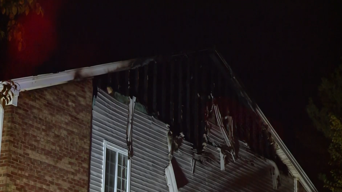 Officials: Over 30 people evacuate after overnight condo building fire ...