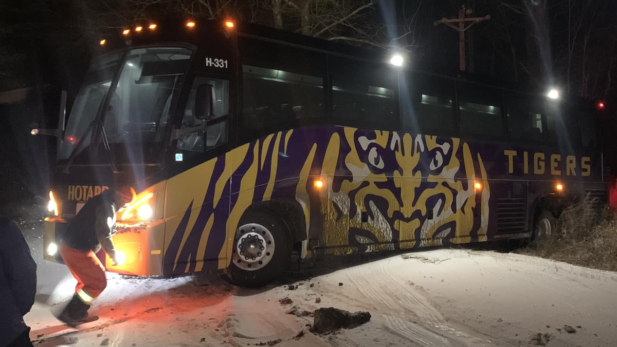 LSU bus slides off icy Arkansas road into ditch