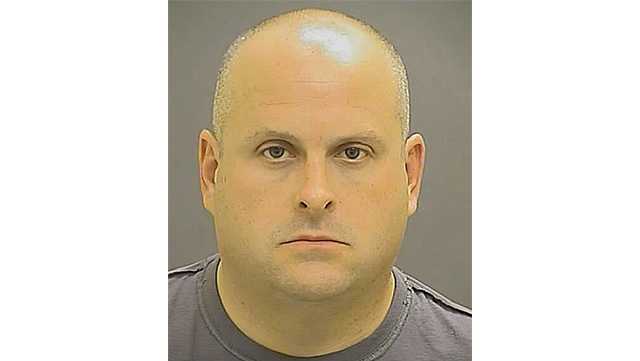 Baltimore police lieutenant charged with theft, fraud Baltimore police lieutenant charged with theft, fraud