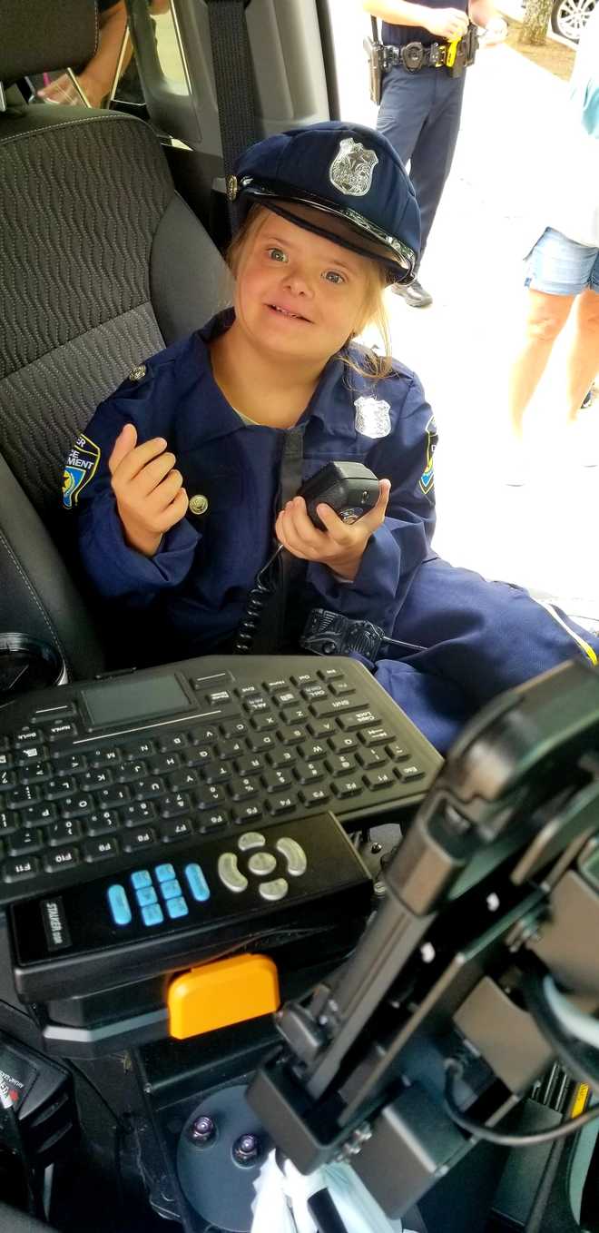 Yukon police help celebrate birthday of child who dreams of being officer