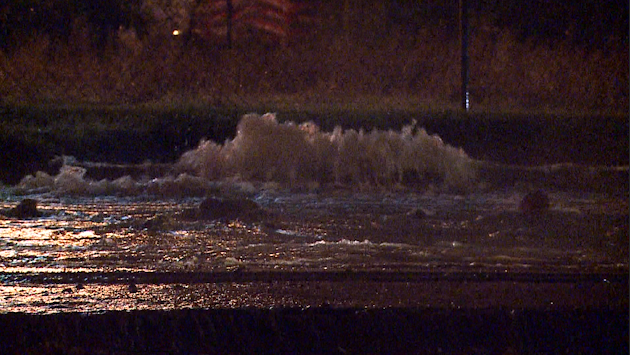 Main break spills water across street near Harvell Drive, Galvin Road