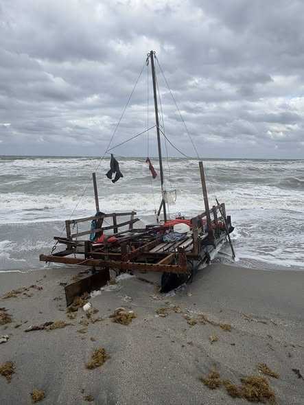 Makeshift vessel washes alongshore at Jupiter Island