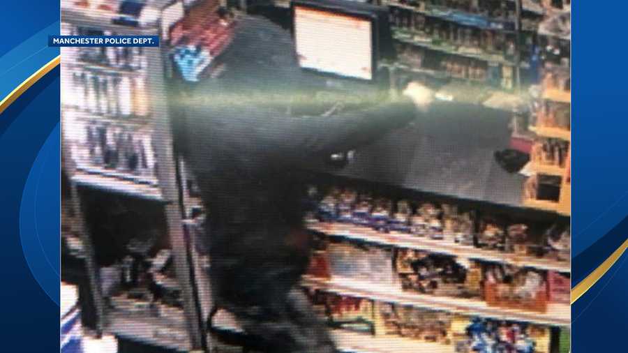 Police in Manchester search for armed robber