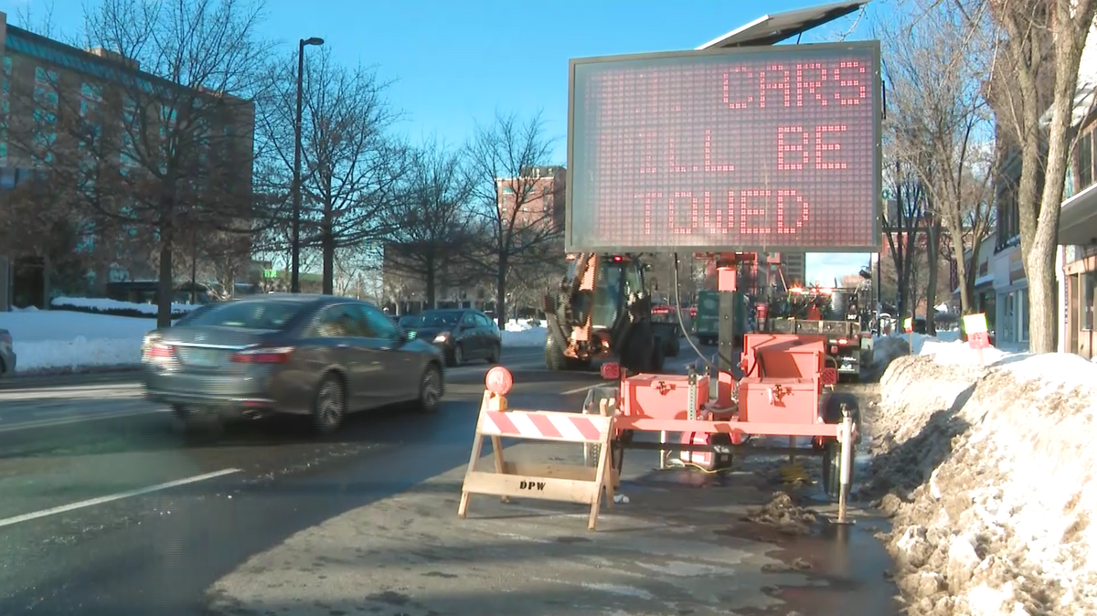 Manchester, NH, crews work to clear snow along Elm Street