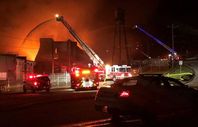 Huge flames tear through warehouse in Marion, North Carolina