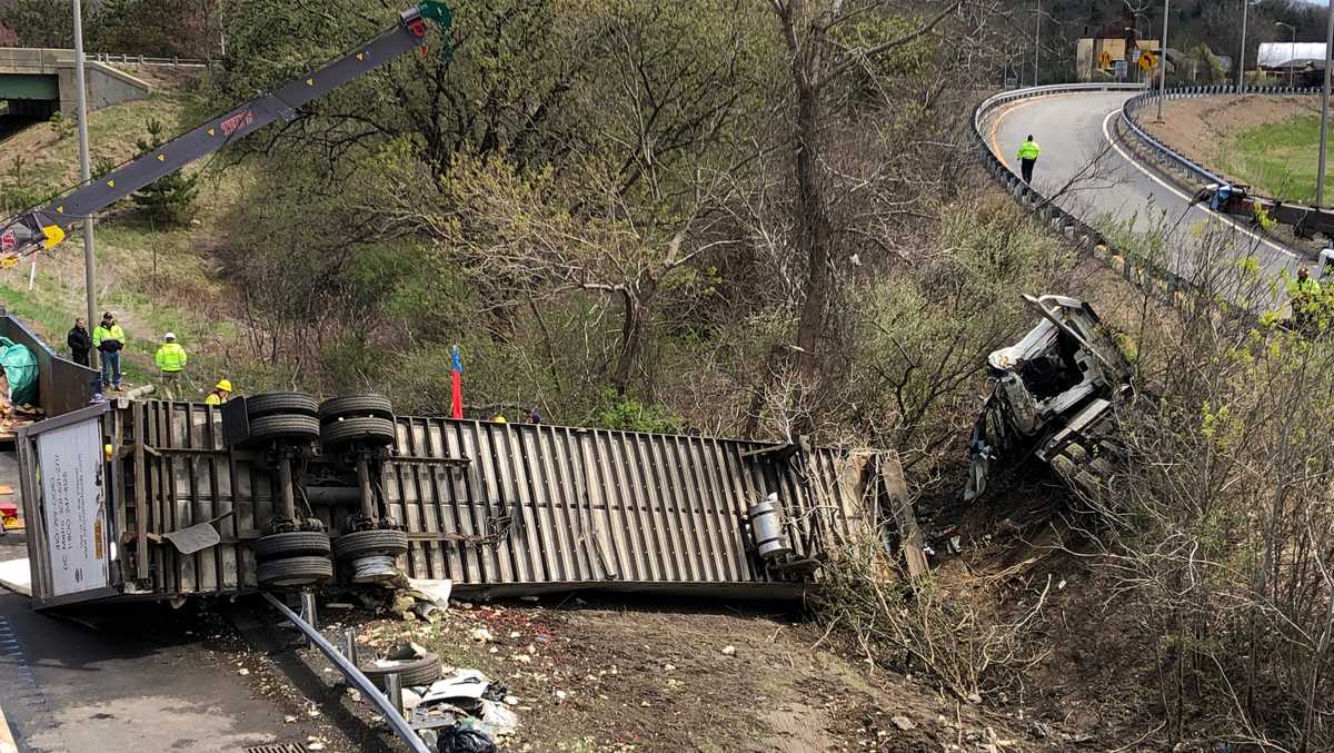 Firefighters extract driver from Mass Pike rollover crash in difficult ...