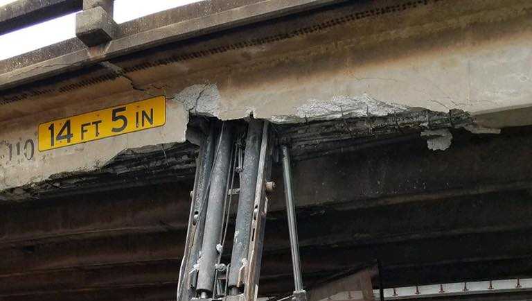 Illegal, oversize load damages bridge over Interstate 85 forcing it to ...
