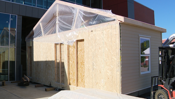 House built by MCC students gets moved in pieces Wednesday