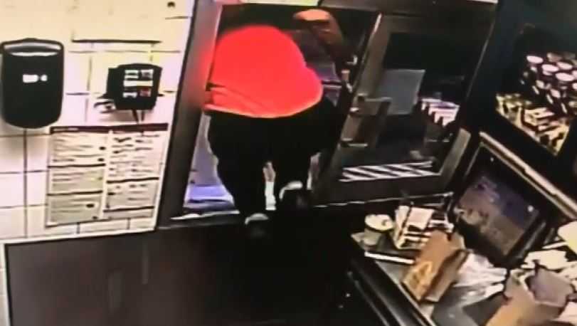 Drive-thru worker leaps through window to help cop