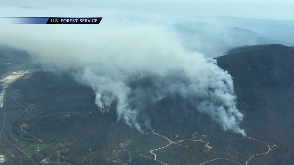 Forest fire continues to grow, threatens homes in western North Carolina