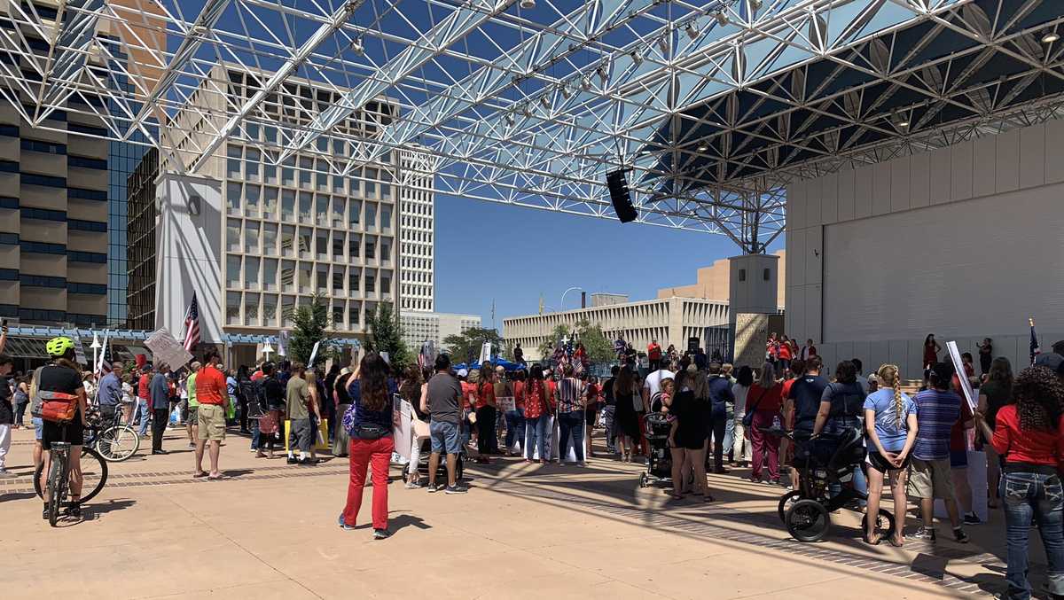 Healthcare workers rally at Civic Plaza against vaccine mandate