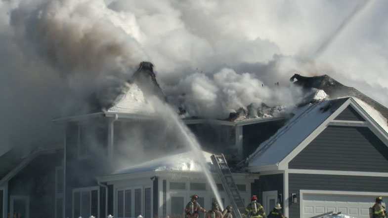 Firefighters battle flames, frigid cold temperatures, while fighting ...