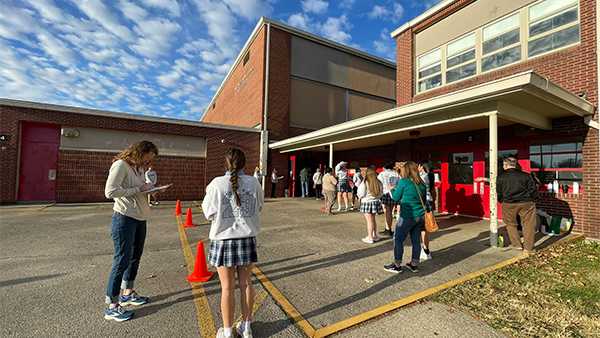 Mercy Academy students conducting exit polling on Election Day
