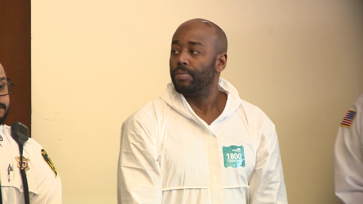 Suspect found dangling from high-rise window in Boston held pending ...