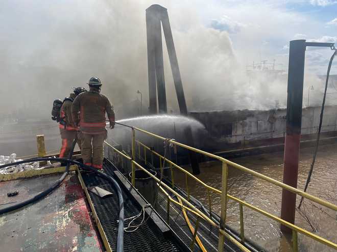 Crews battle barge fire on Ohio River; shelter-in-place lifted