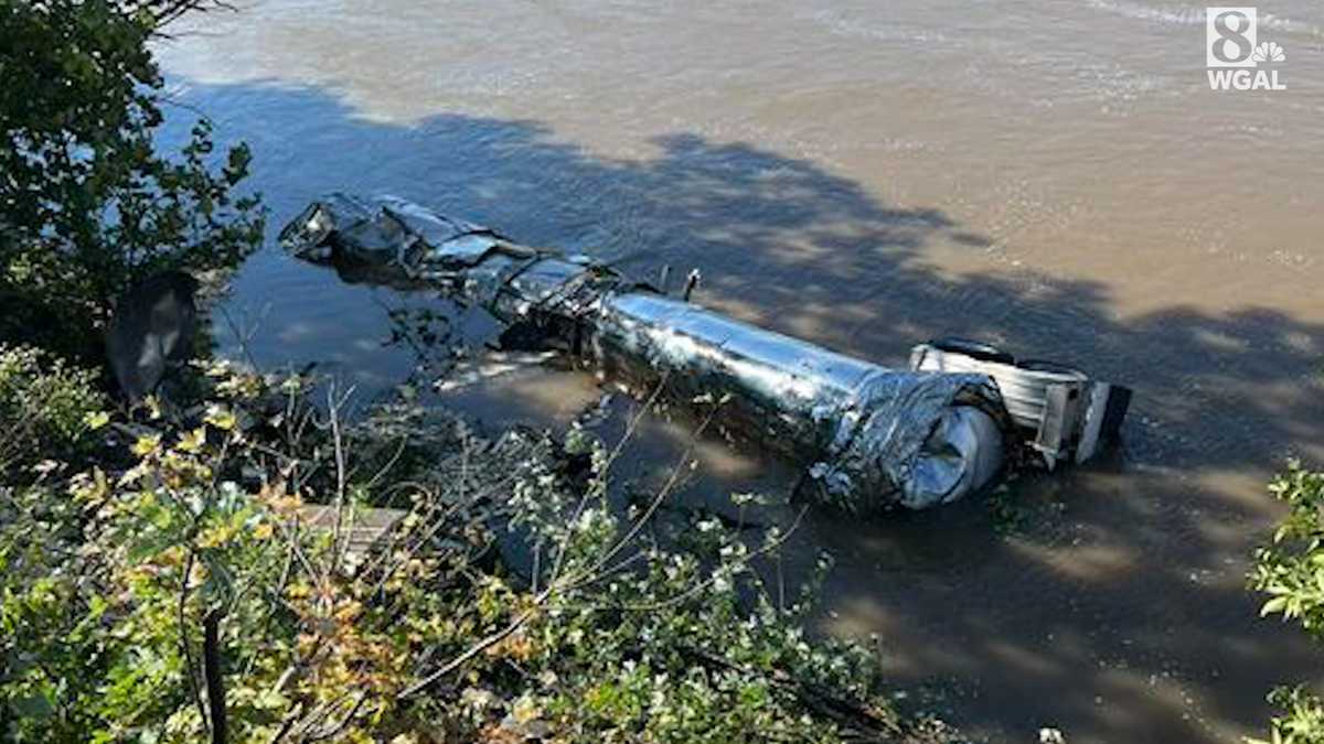 Tanker truck crashes, spills milk into a Pennsylvania river