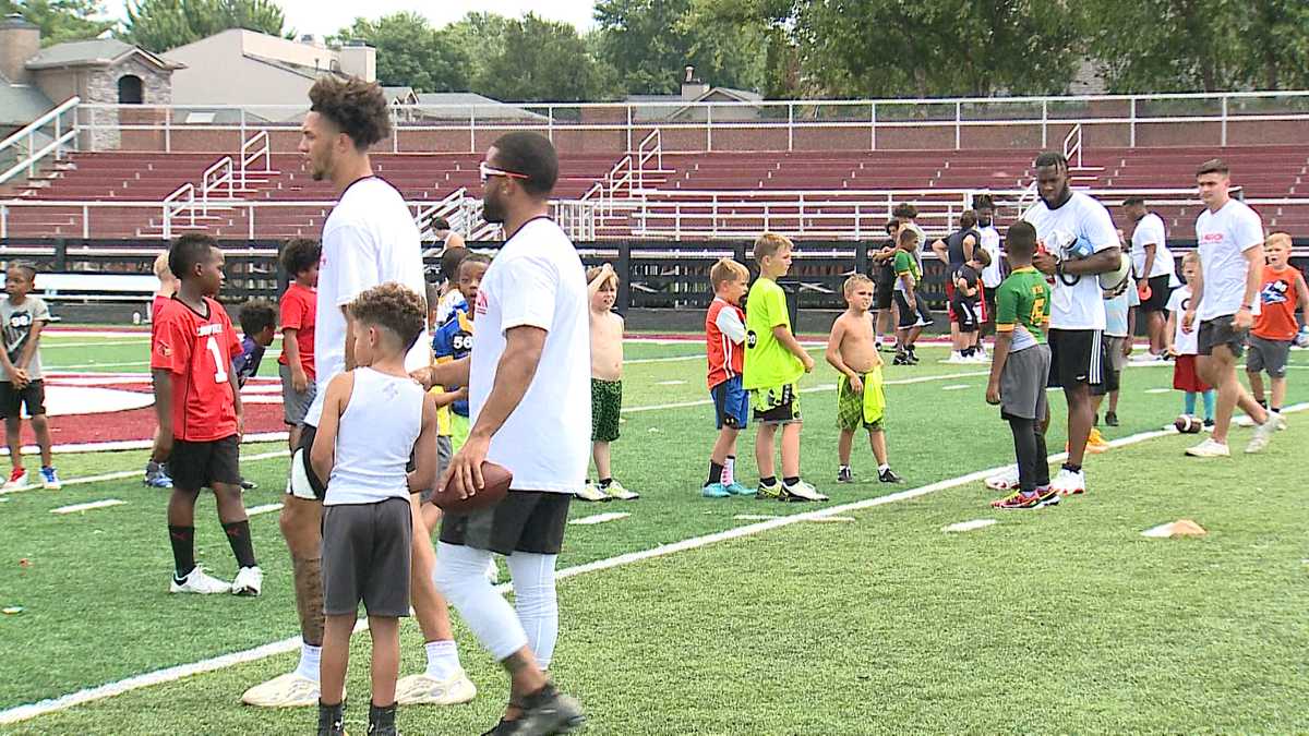 Louisville's Josh Minkins and Marshon Ford host campers at Ballard