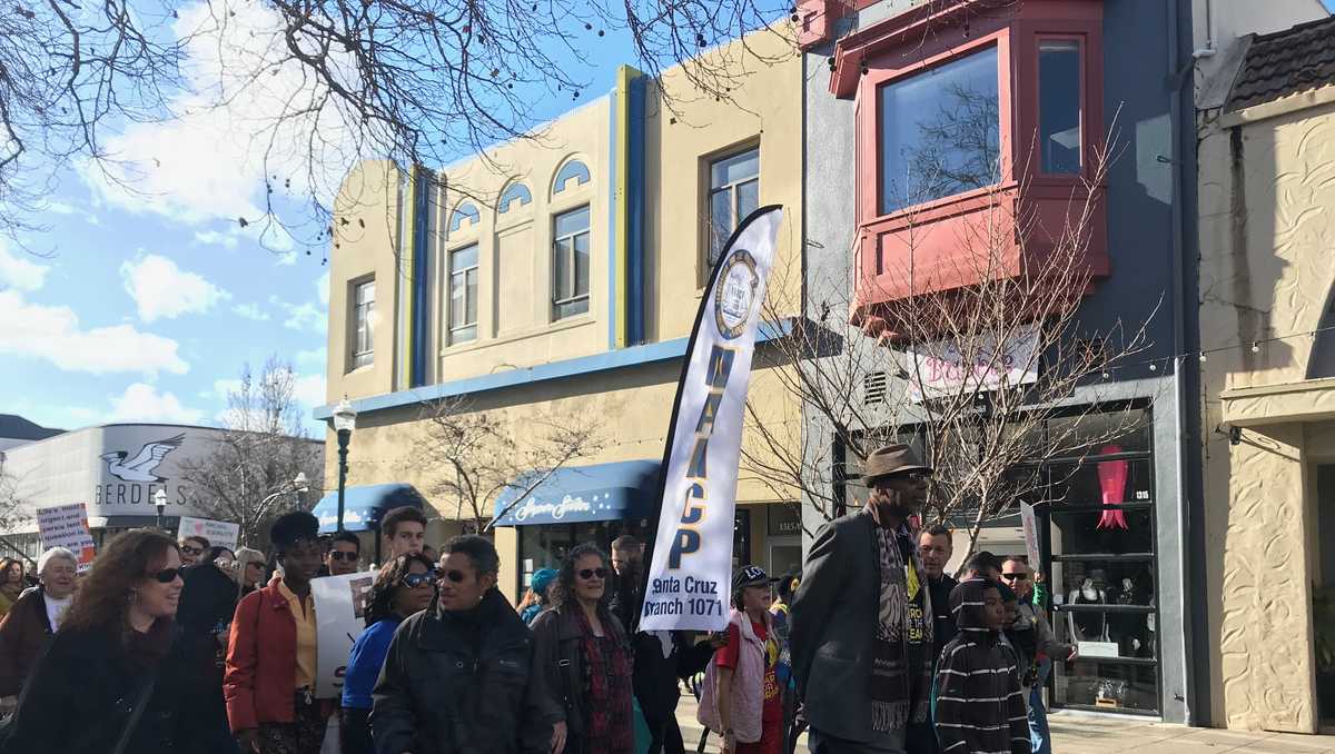 People gather for March For The Dream event in Santa Cruz