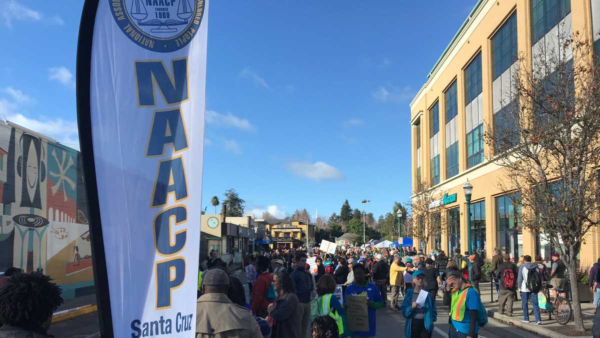 People gather for March For The Dream event in Santa Cruz