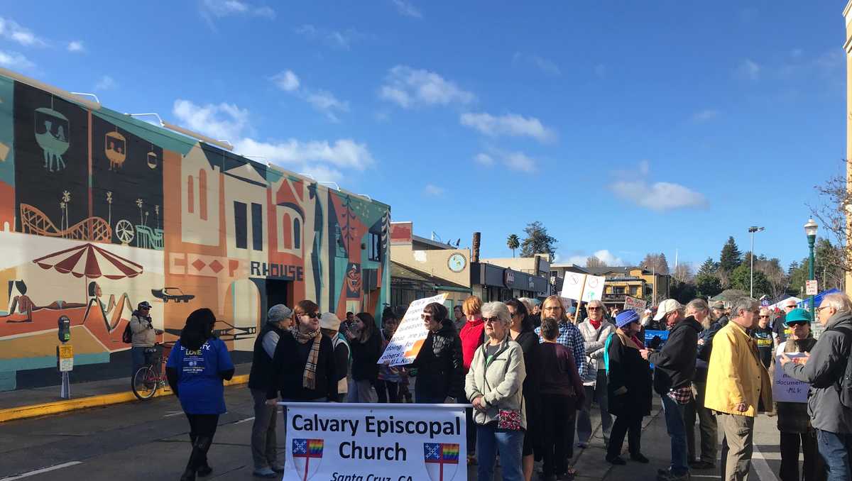 People gather for March For The Dream event in Santa Cruz