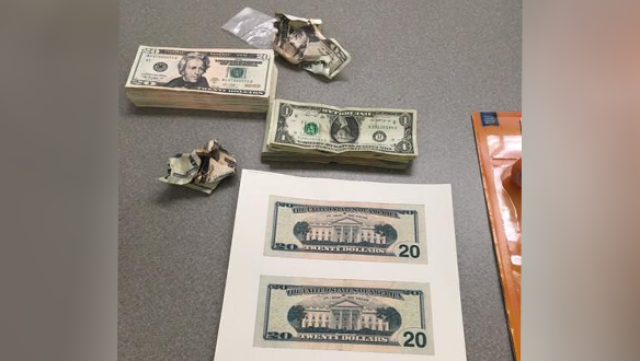 Here's how you can spot counterfeit money