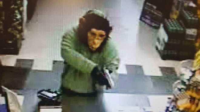 Police search for 'Monkey masked' robber