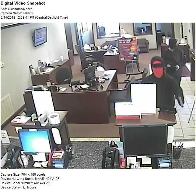 Police searching for two who robbed Moore bank at gunpoint