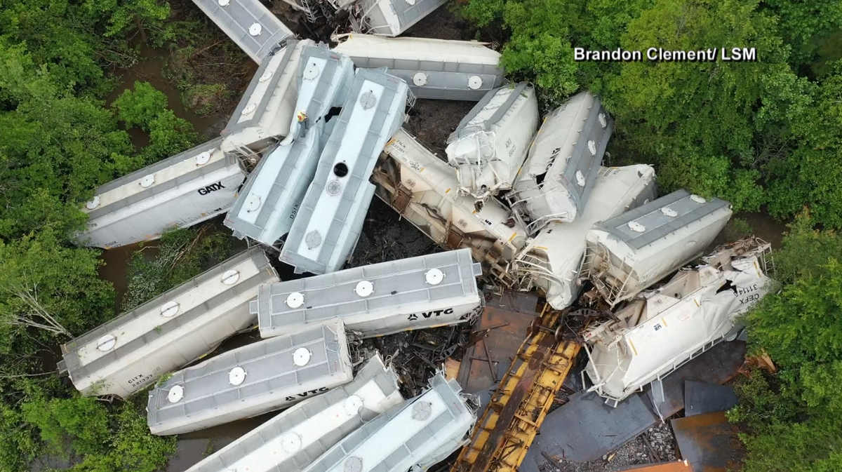 Freight train derails in Mississippi during flash flooding