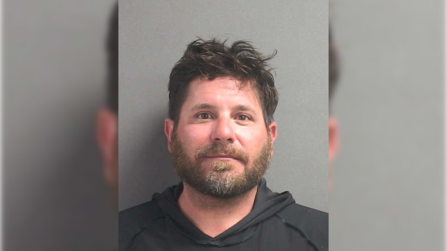 Florida man on boat accused of pointing gun at kids making waves
