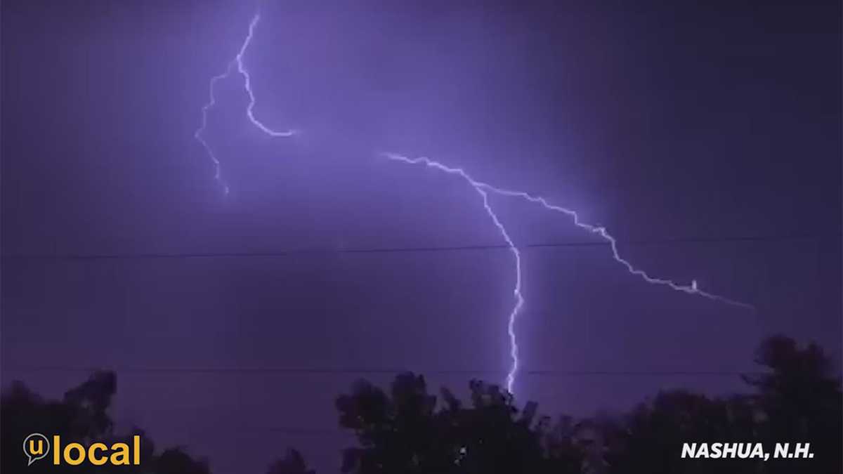 Rainbow lightning? Bolt strikes through rainbow in night sky